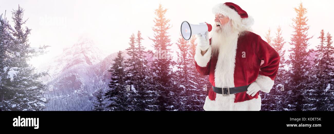 Digital composite of Santa Claus in Winter with loudspeaker Stock Photo ...