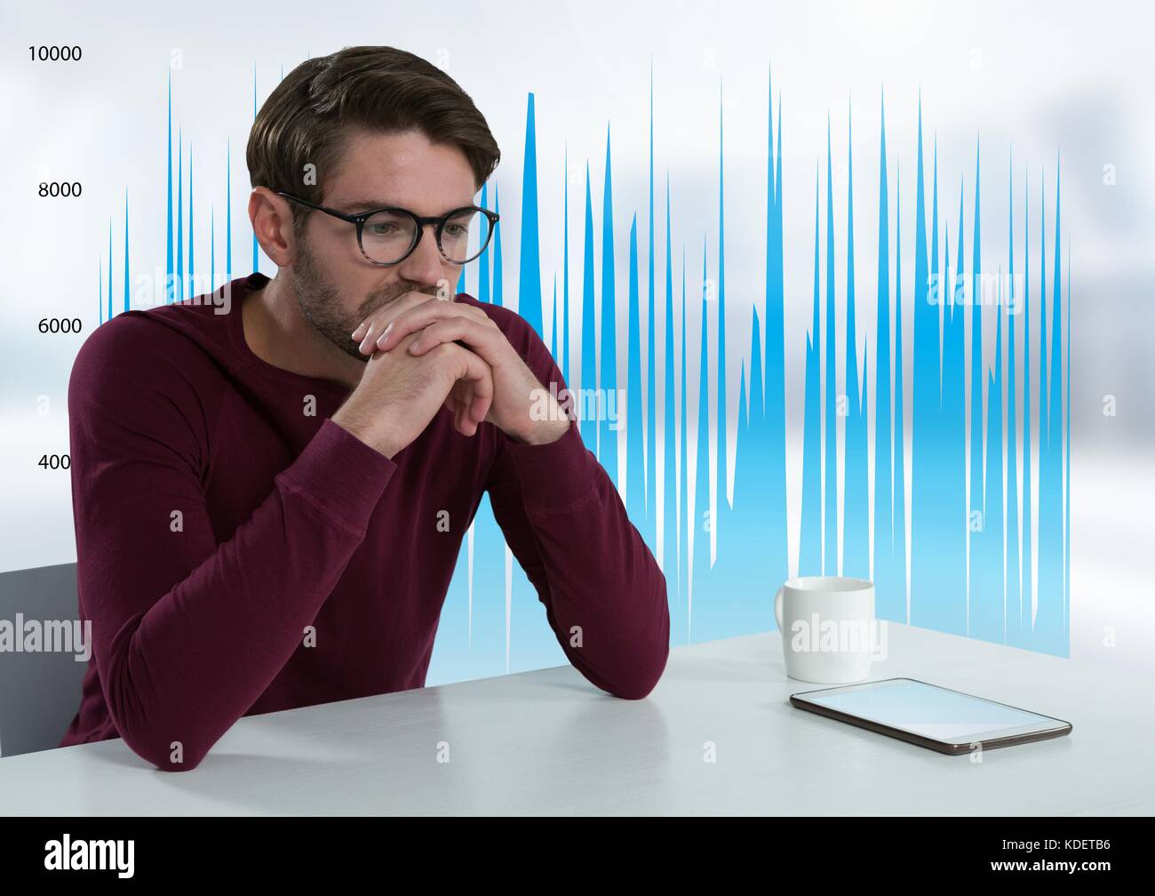 Digital composite of Businessman at desk with tablet and wave length ...