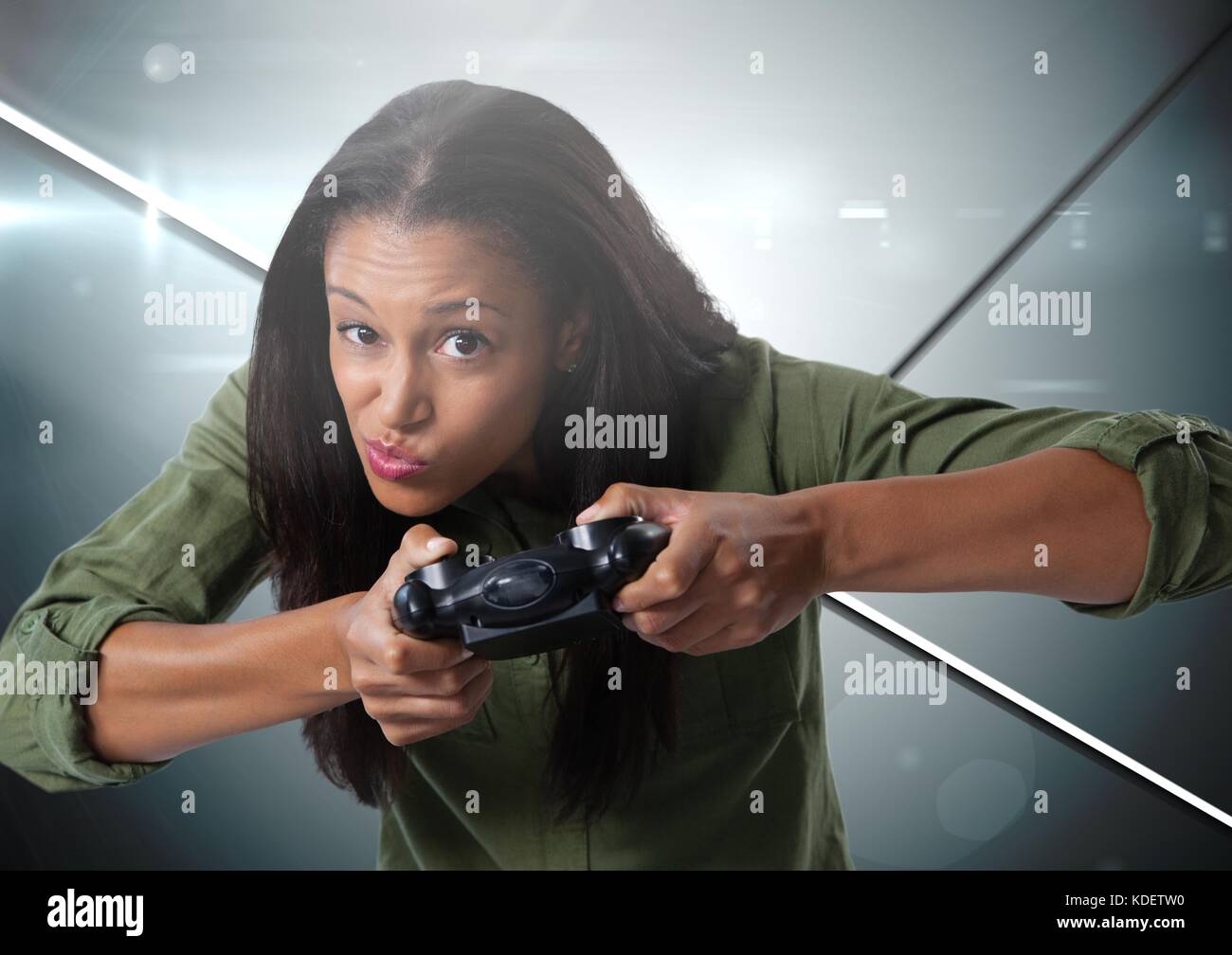 Digital composite of woman playing with computer game controller Stock ...