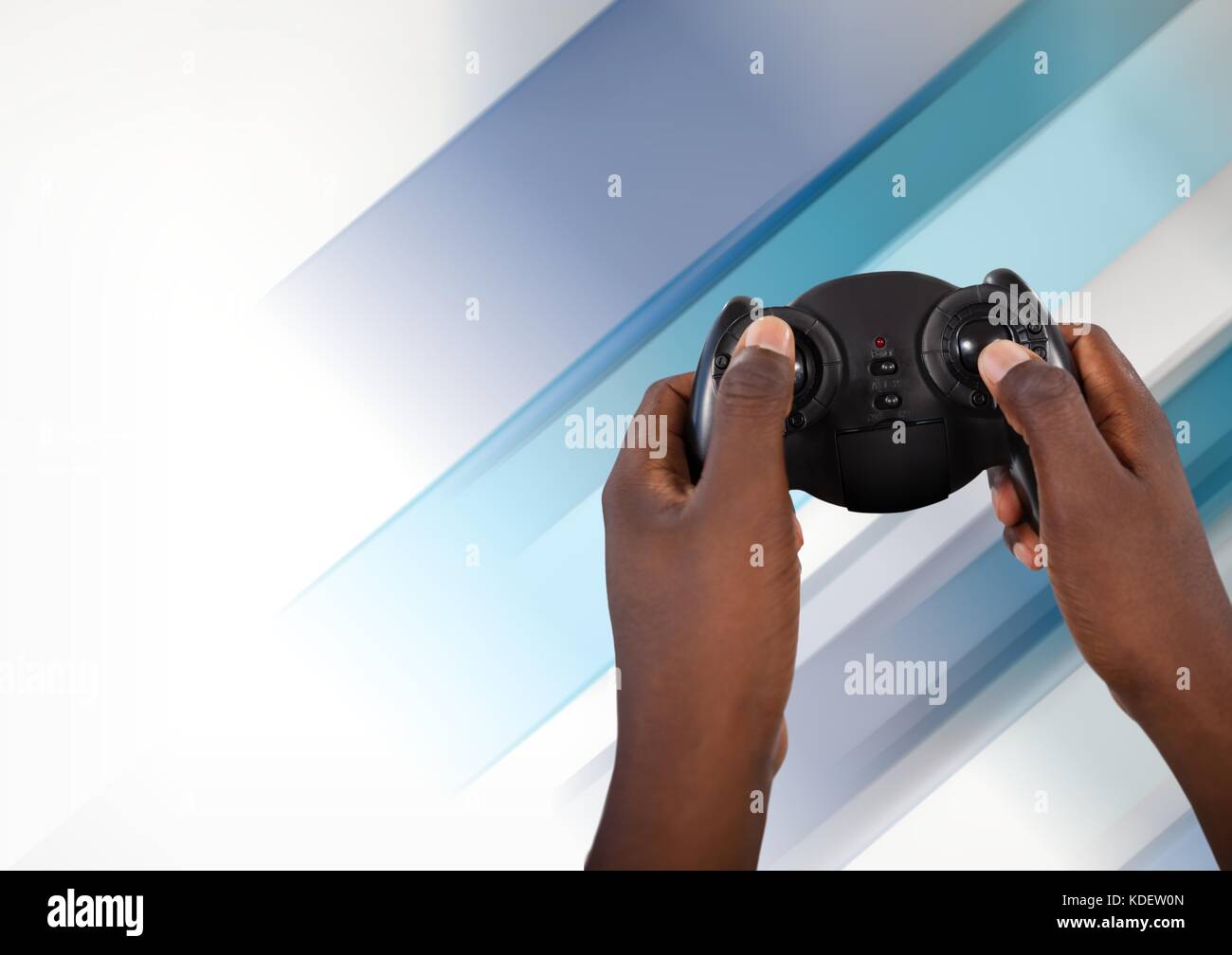 Digital composite of Hands playing with computer game controller with ...