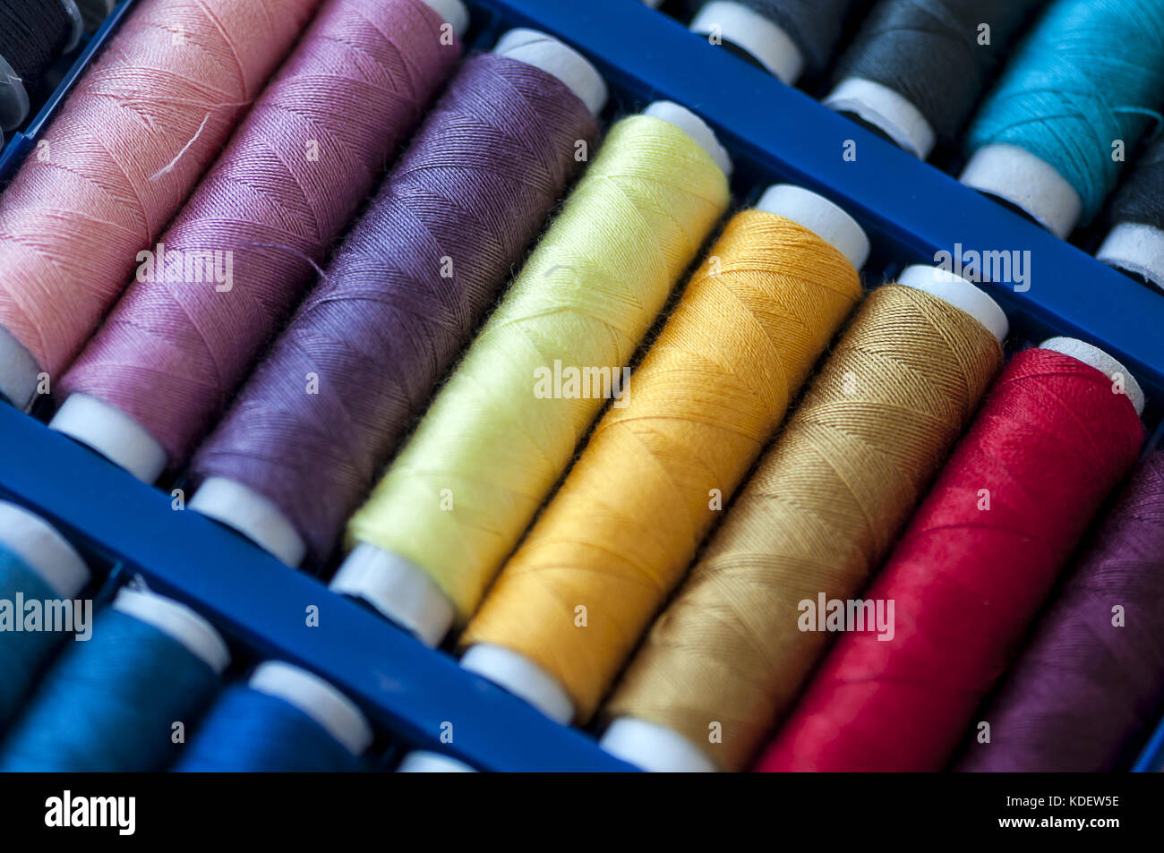 Colored sewing threads Stock Photo - Alamy