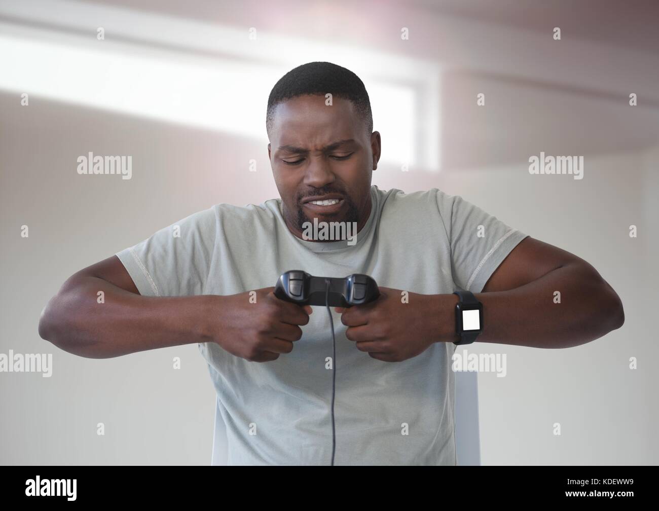 Digital composite of man frustrated playing with computer game ...