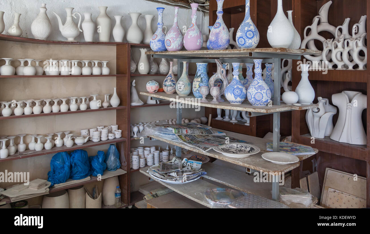 Shelves with dishes in the ceramic workshop Stock Photo - Alamy