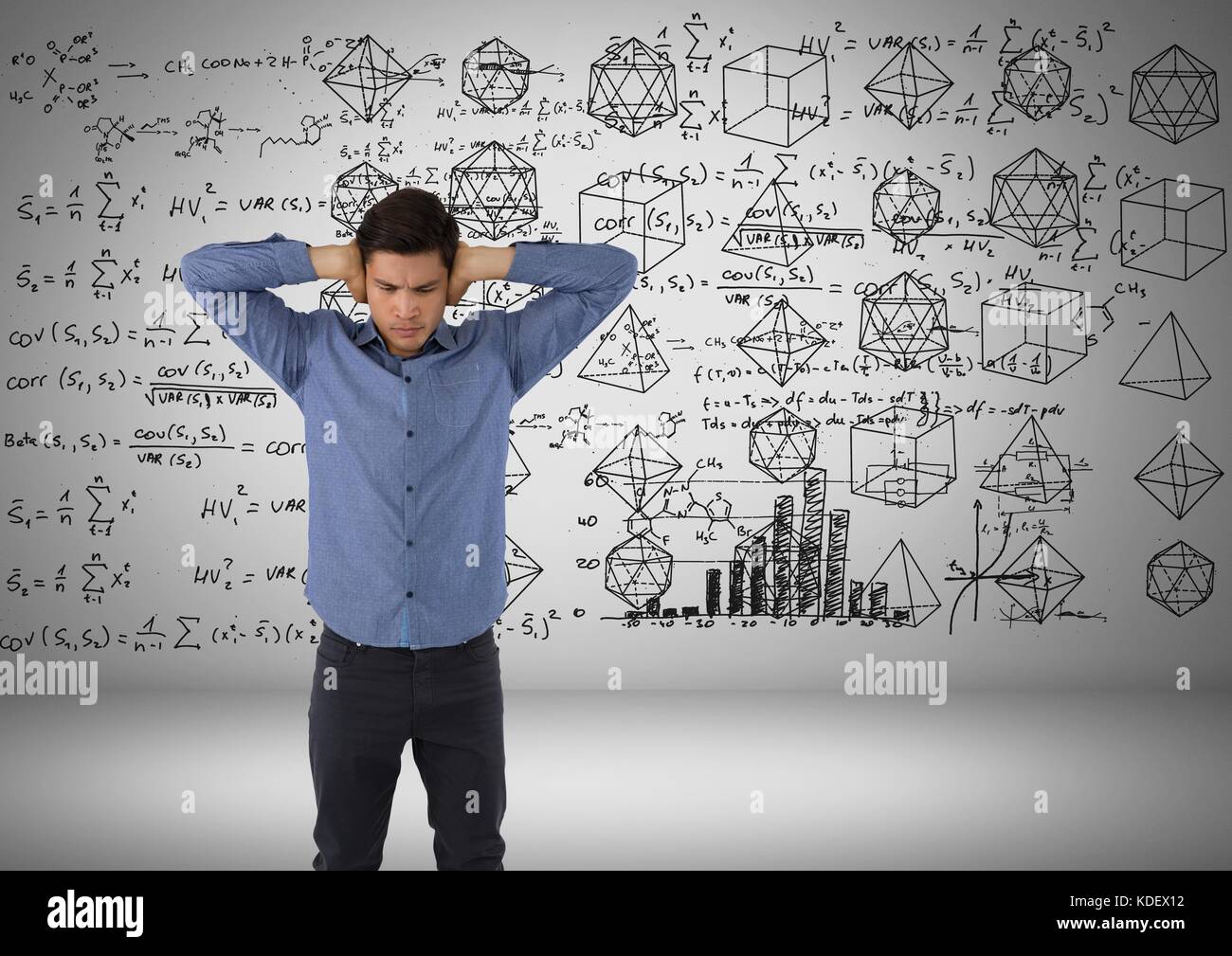 Digital composite of frustrated man with math background Stock Photo ...