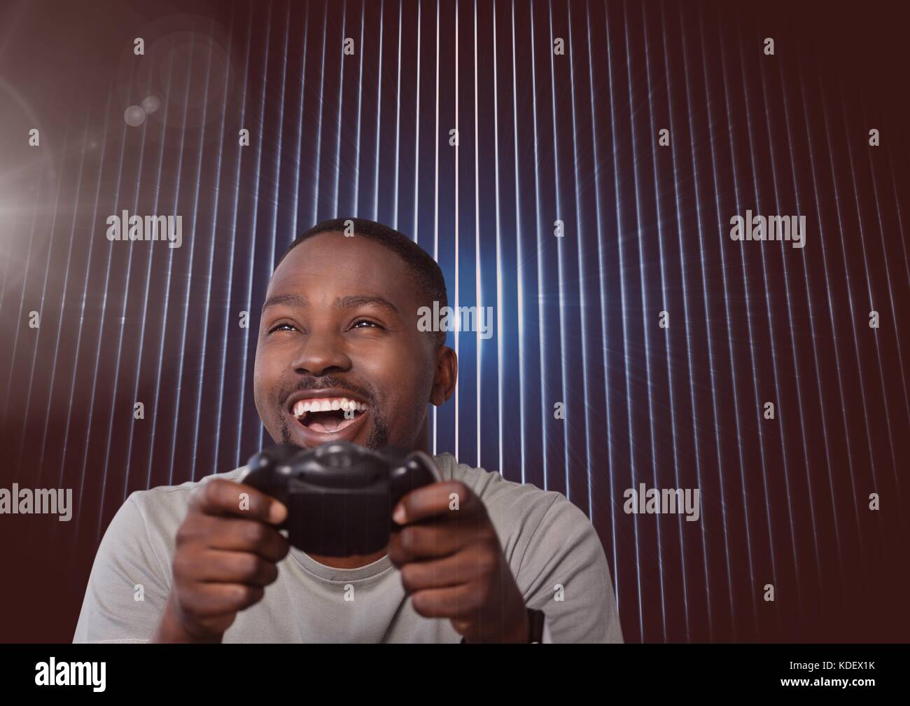 Digital composite of man playing with computer game controller Stock ...