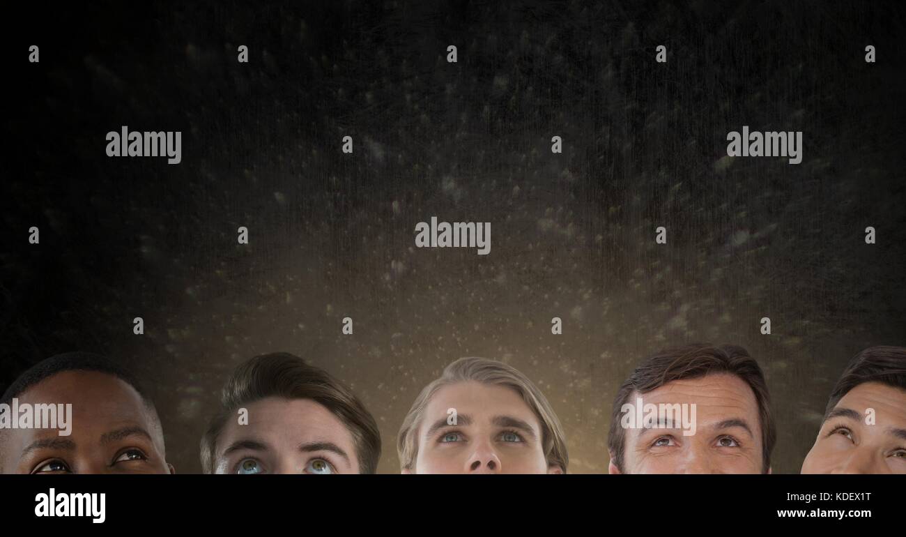 Digital composite of heads looking up at question mark Stock Photo - Alamy