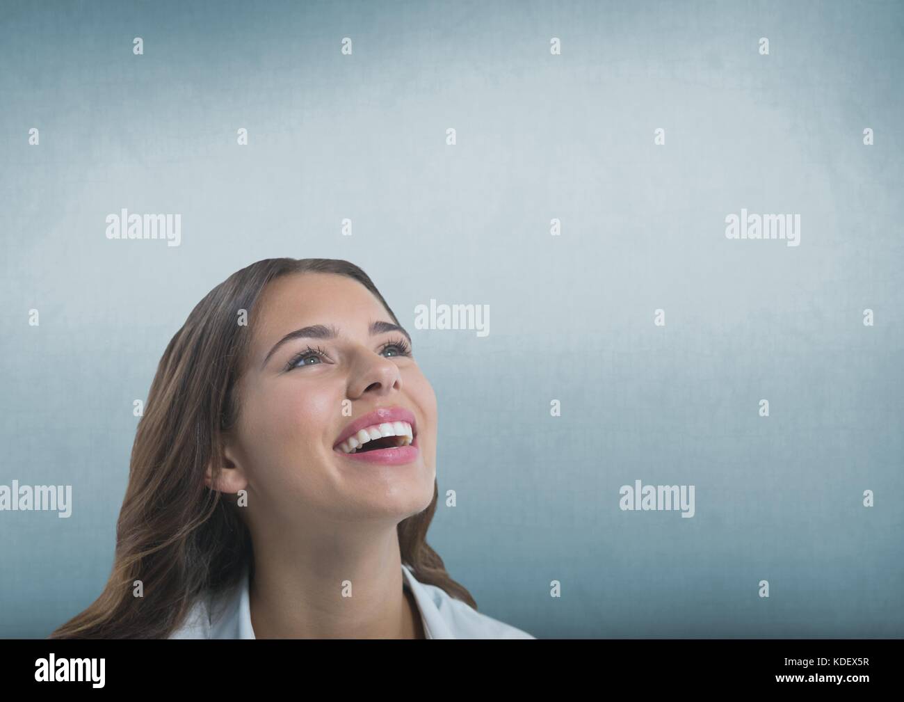 Woman fearful looking back hi-res stock photography and images - Alamy