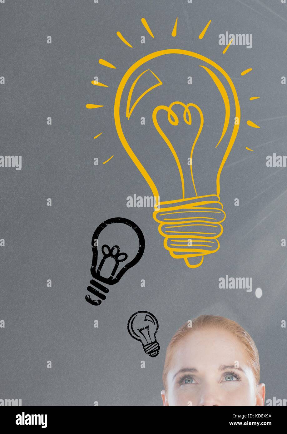 Digital composite of woman looking up at light bulb Stock Photo - Alamy