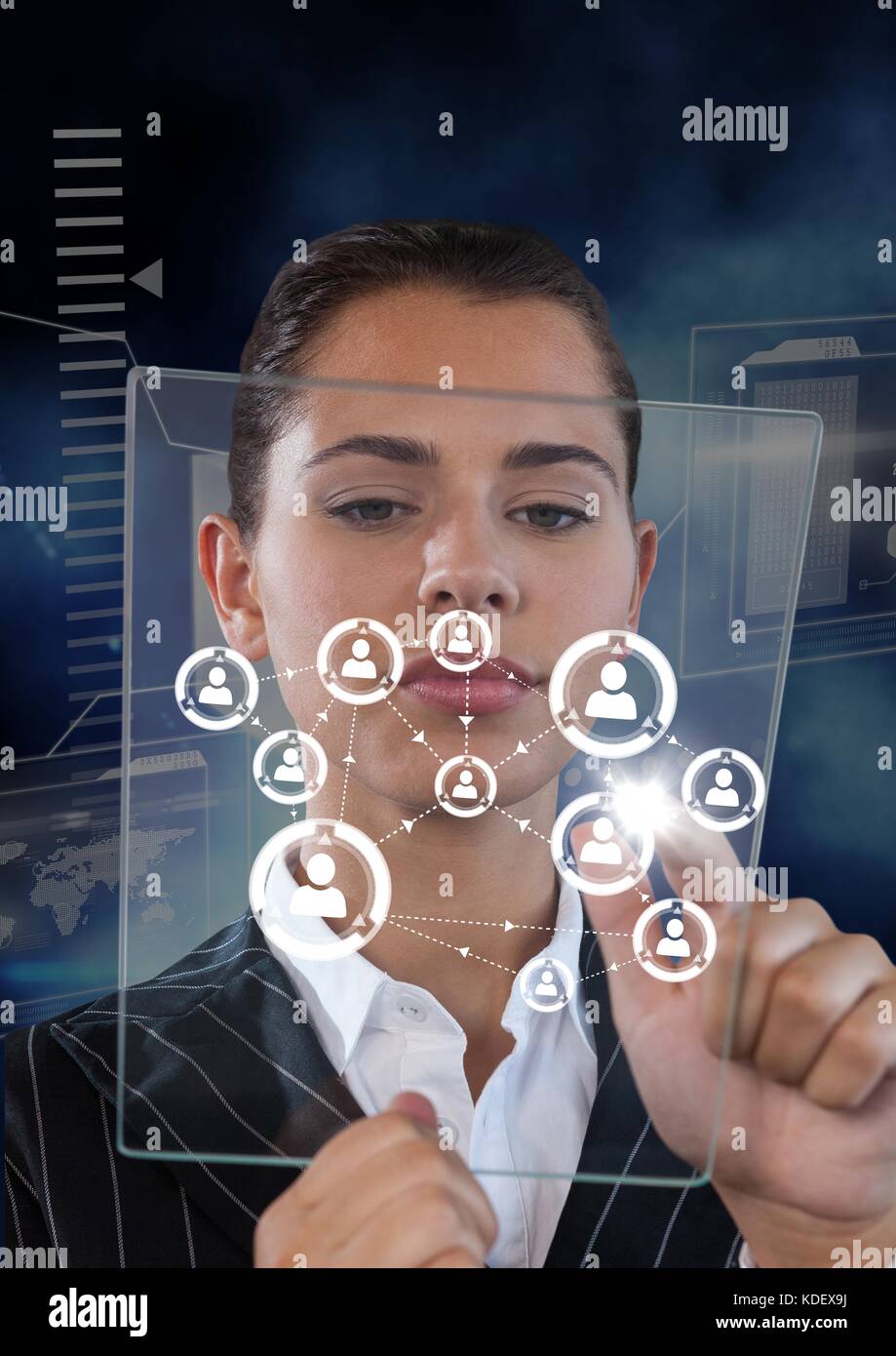 Digital composite of woman holding glass interface Stock Photo - Alamy