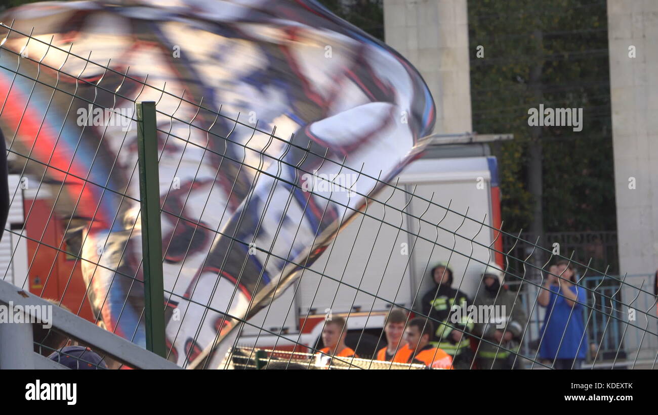 flag waving fans at a football match Stock Photo - Alamy