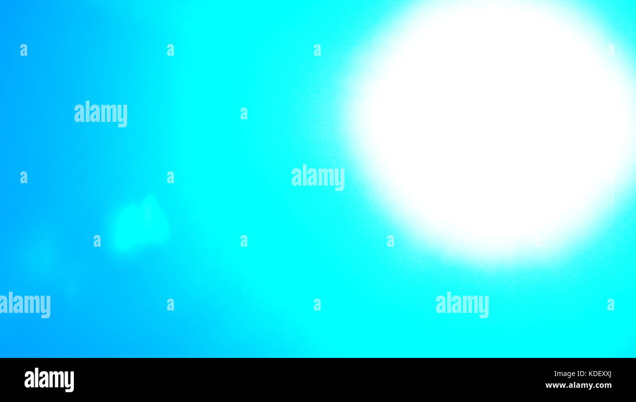 strobe lights emitting different color beams hanging under the ceiling ...