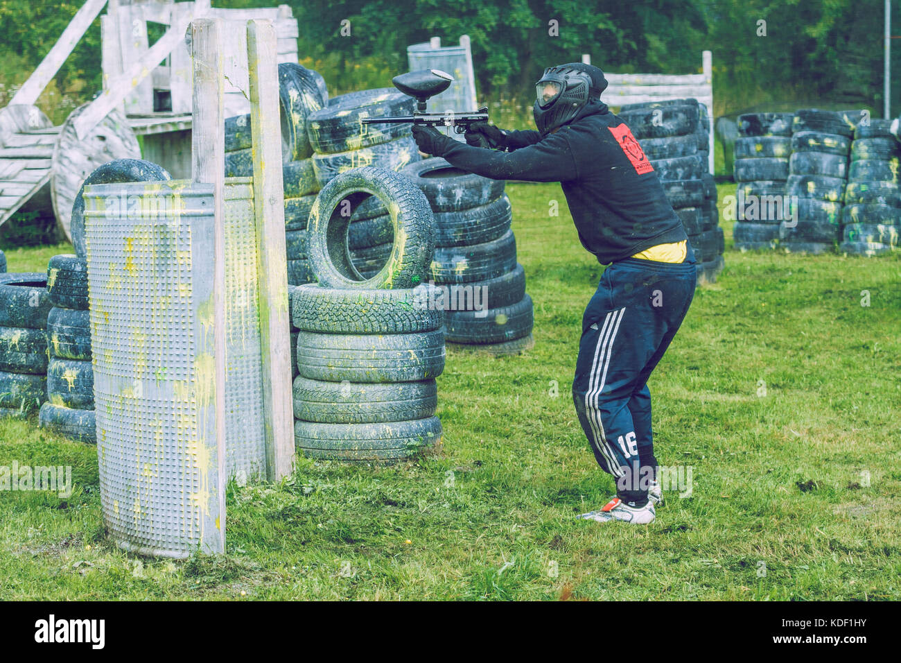 Paintball game battle, players and guns. Latvia, Cesis. 2012 Stock ...