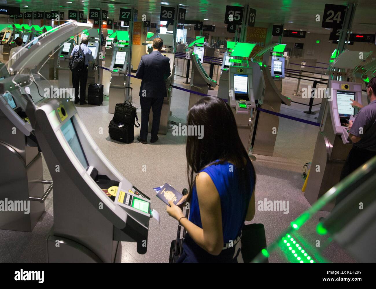 U.S. Customs and Border Protection Field Operations officers process ...