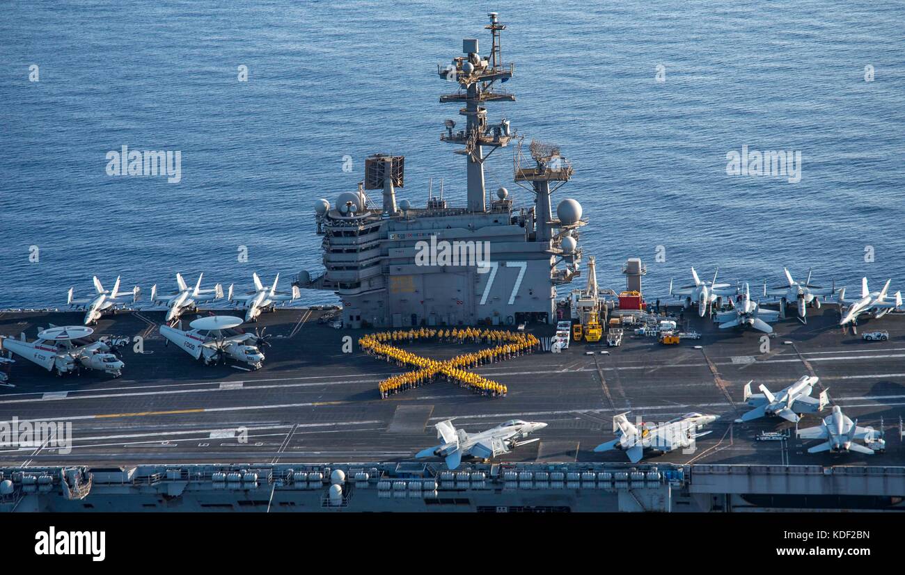 U.S. sailors form a yellow human ribbon in support of Suicide ...