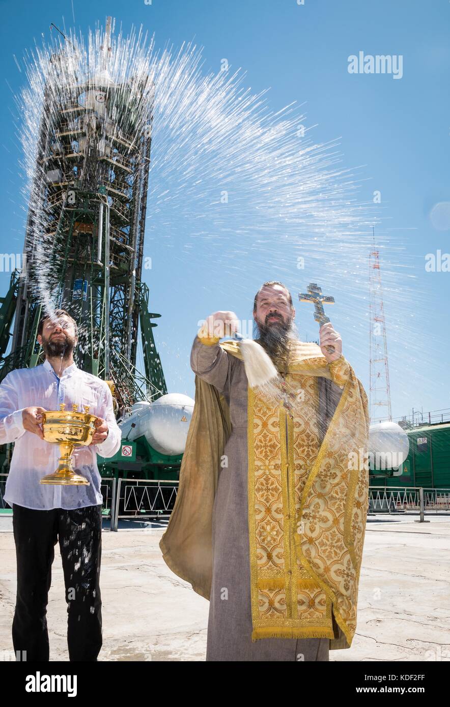 An Orthodox Priest blesses the Soyuz MS-05 spacecraft during a ...