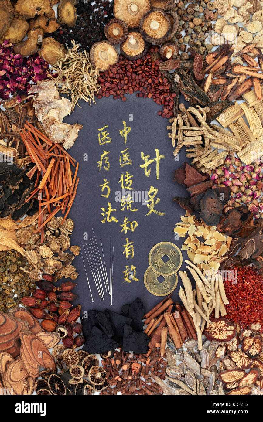 Chinese acupuncture needles, feng shui coins with herbs and calligraphy ...