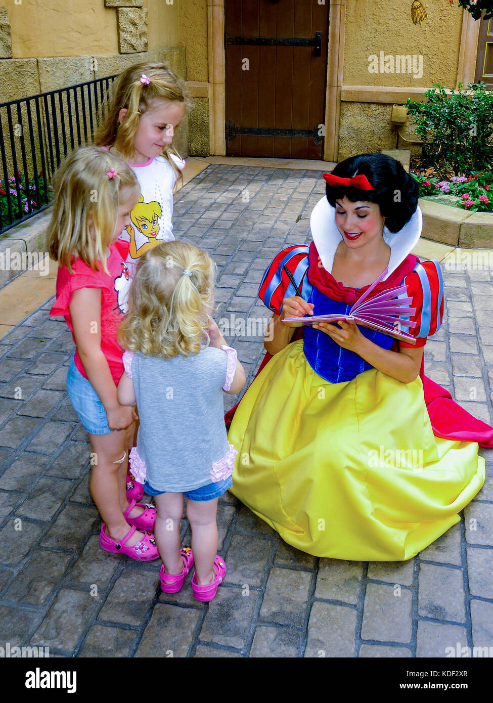 Children meeting Snow White, in Epcot, Disney World, Florida USA Stock ...