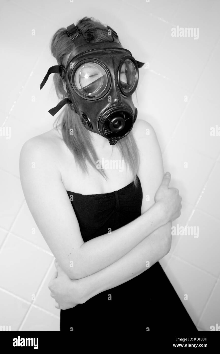Girl in an alternative fashion picture wearing a gas mask Stock Photo ...