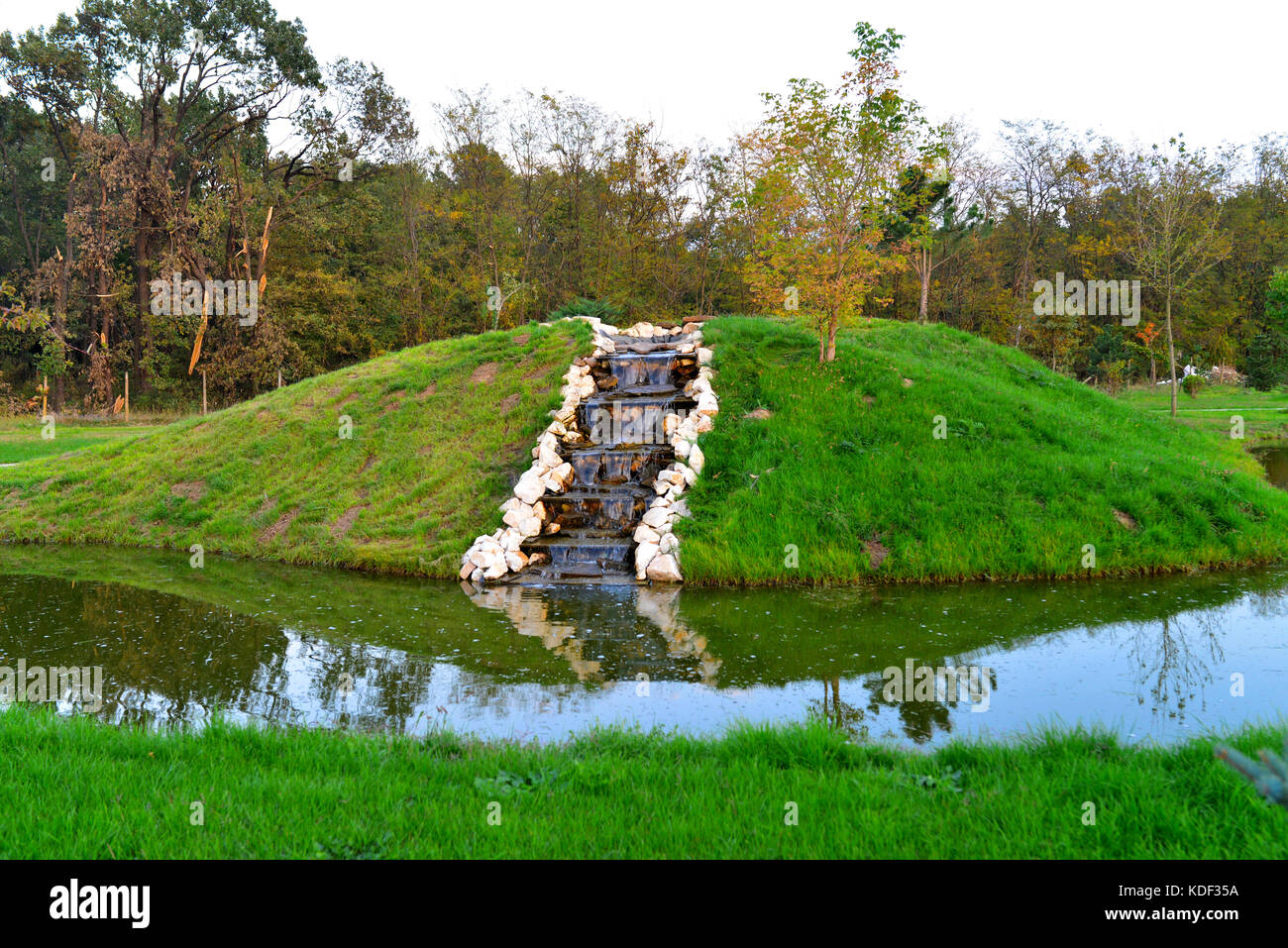Garden landscape design pond and cascade nature detail Stock Photo - Alamy