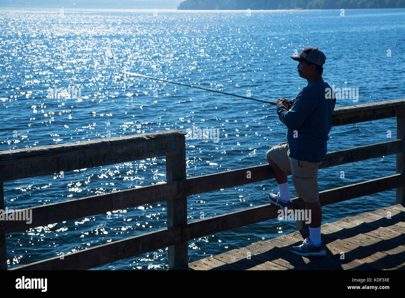 Fishing, Tramp Harbor Dock Park, Vashon Island, Washington Stock Photo ...