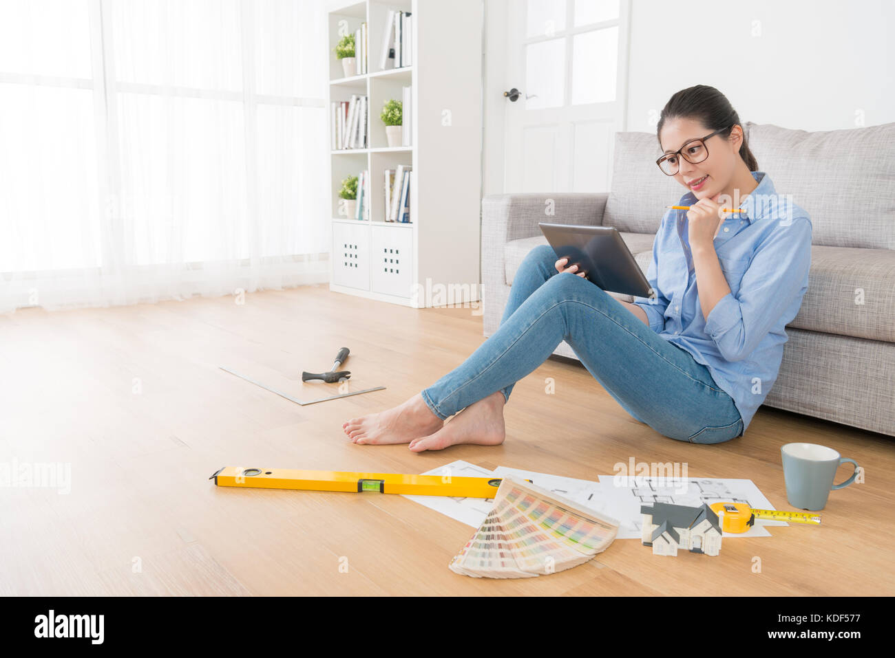 beautiful smiling housewife drawing house interior design sketch on ...