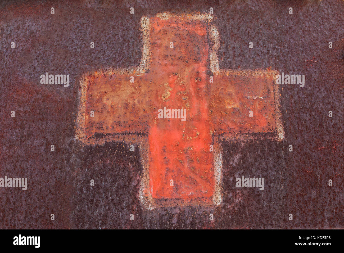 Rusted medical red cross on junkyard ambulance Stock Photo - Alamy