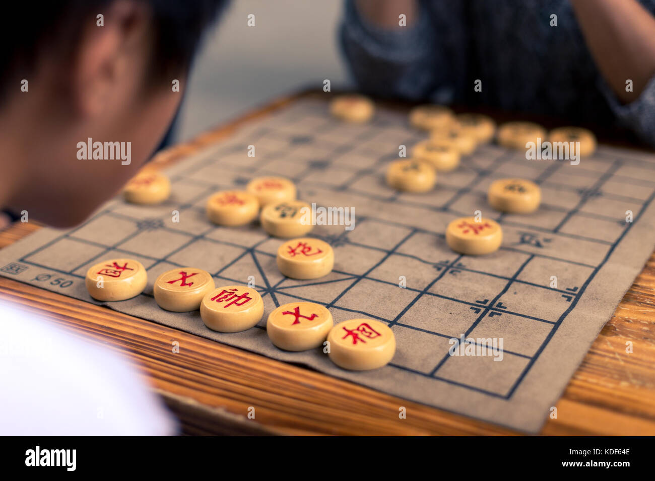 Old man playing chinese chess hi-res stock photography and images - Alamy