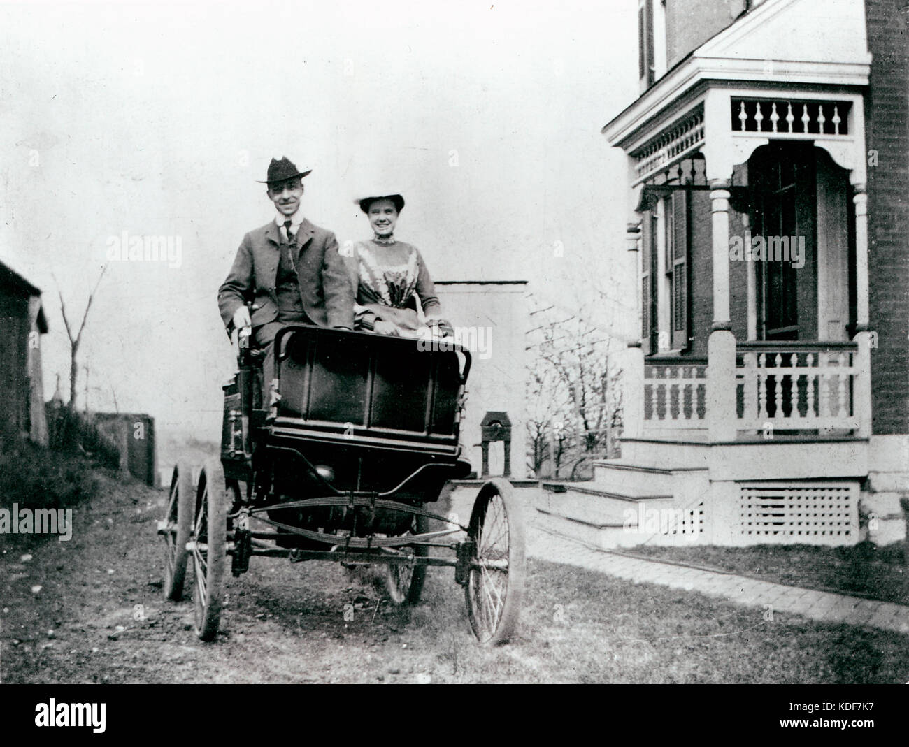 Mr. and Mrs. J.F. Kraft in a steam buggy built by Kraft in 1901. The ...