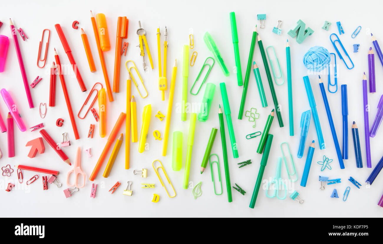 Variety od school supplies in bright rainbow colors Stock Photo - Alamy