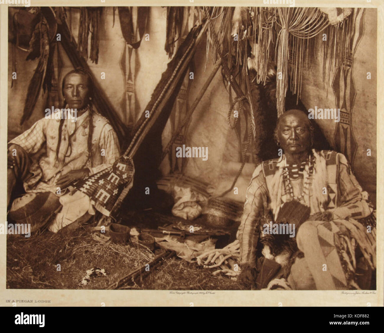 In a Piegan Lodge, 1910 Stock Photo - Alamy