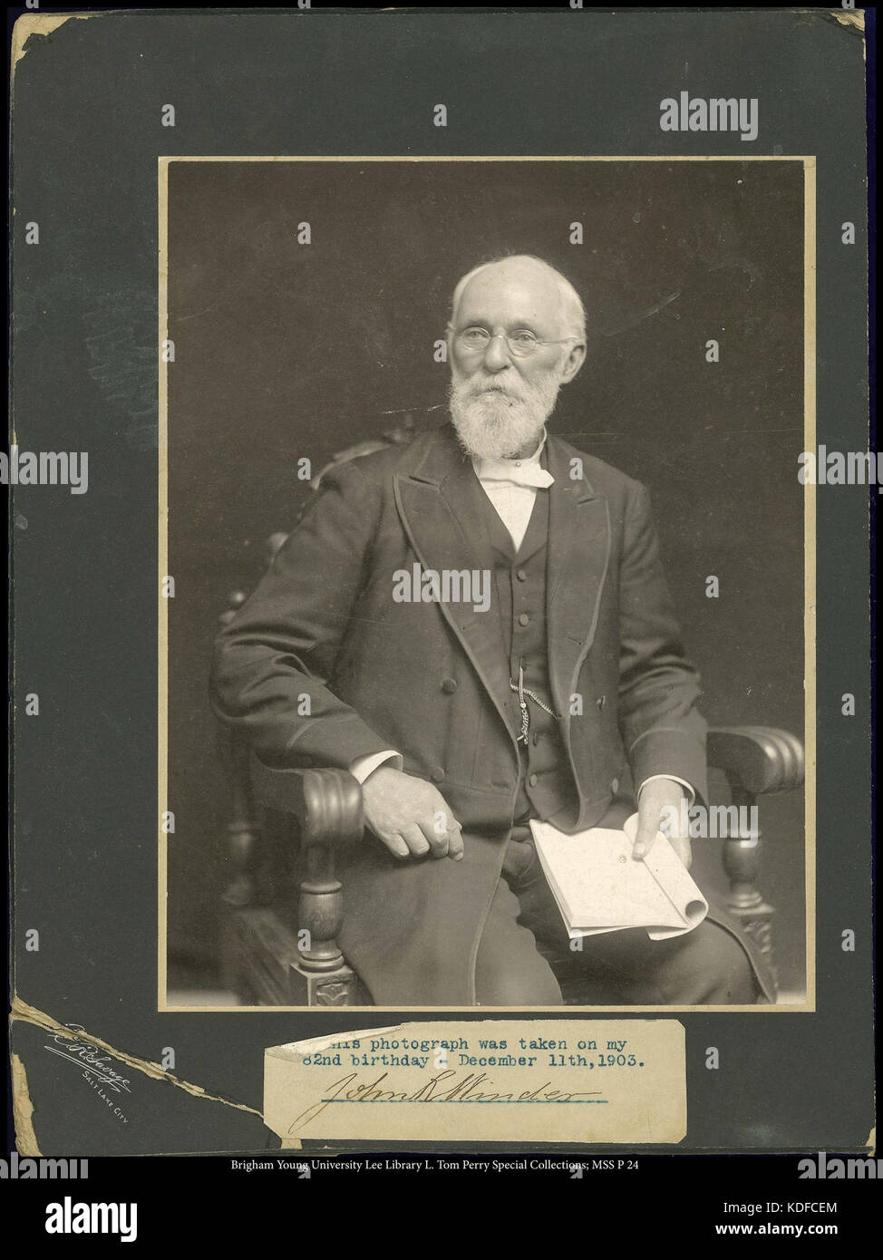 Old man sitting portrait Stock Photo - Alamy