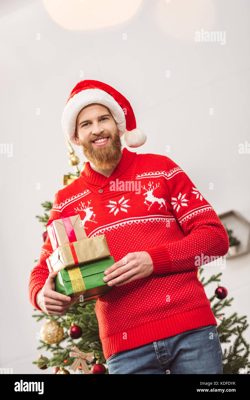 Hold christmas presents hi-res stock photography and images - Alamy