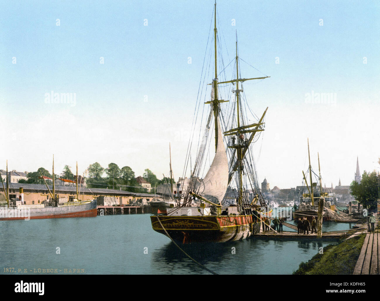 This early 1900s photograph shows the harbor in Lübeck, Germany ...