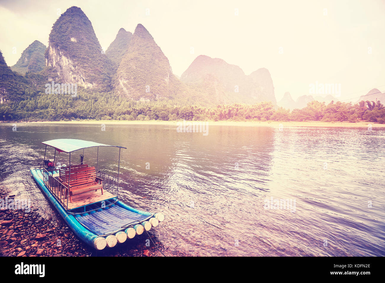 Vintage stylized picture of a bamboo raft at Li River, Xingping, China ...
