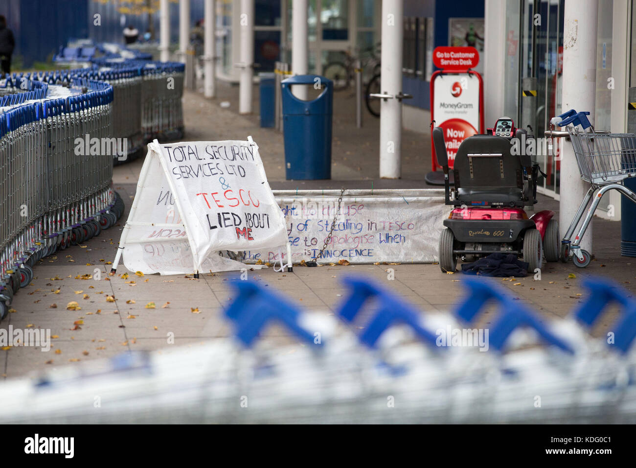 Signs remain outside a Tesco Extra store in Reading where a former ...