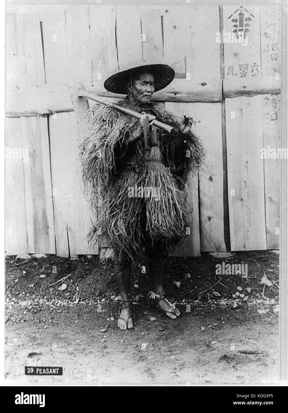 Peasant wearing raincoat of straw, Japan, ca. 188 LCCN2001705671 Stock ...