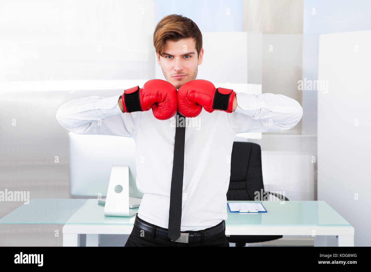 Wearing red gloves hi-res stock photography and images - Alamy