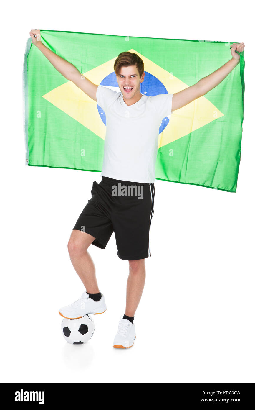 Soccer Player Holding Brazil Flag Over White Background Stock Photo - Alamy