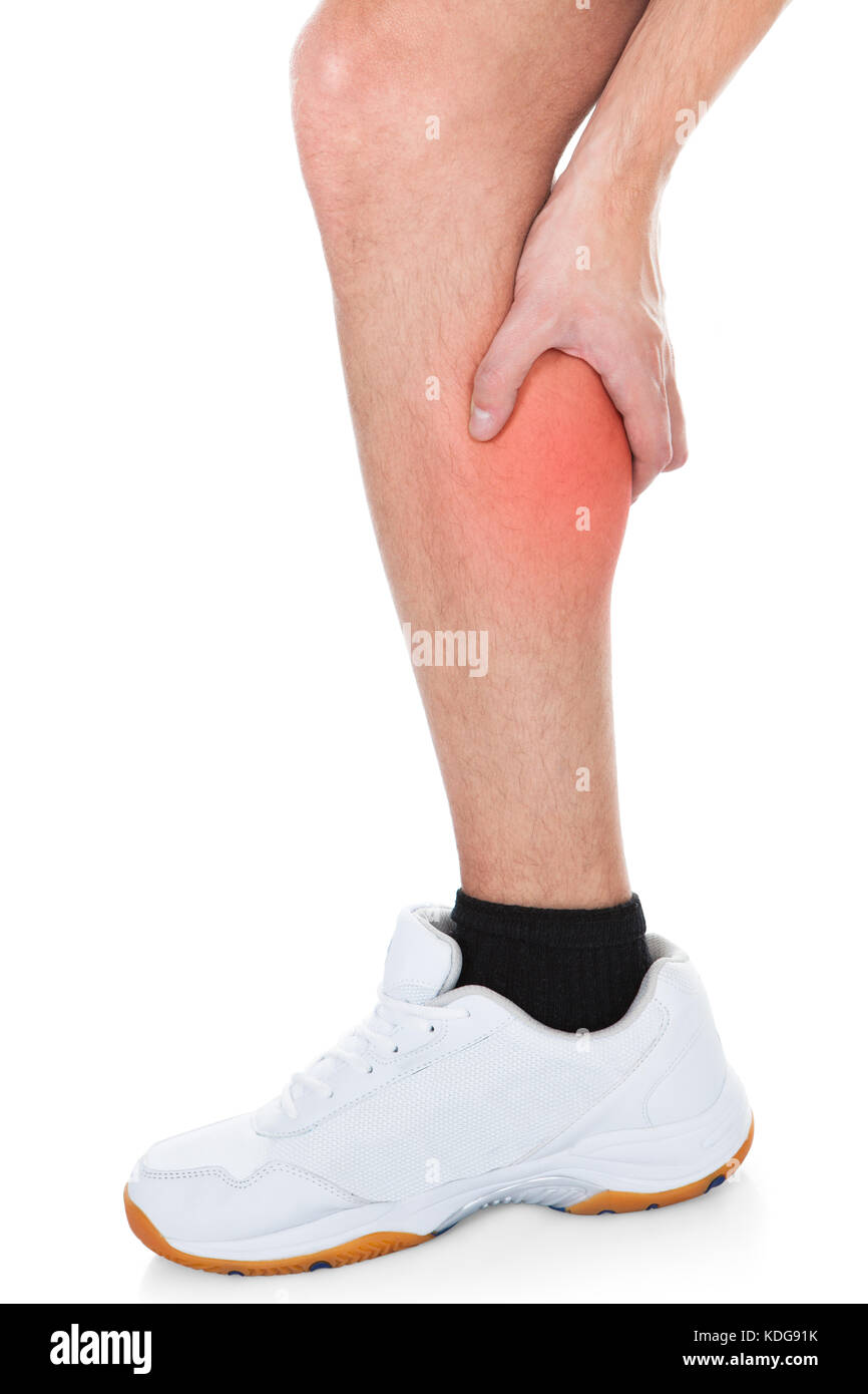 Close-up Of Man's Leg Suffering From Injury On White Background Stock ...