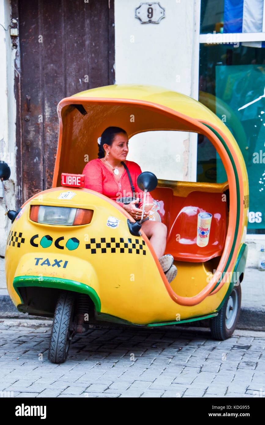Cuban Woman , Coco Taxi driver Stock Photo - Alamy