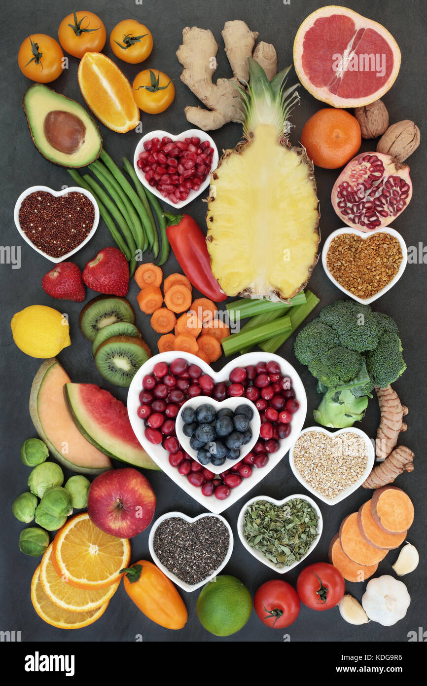 Health food for healthy eating concept with fruit, vegetables, seeds ...