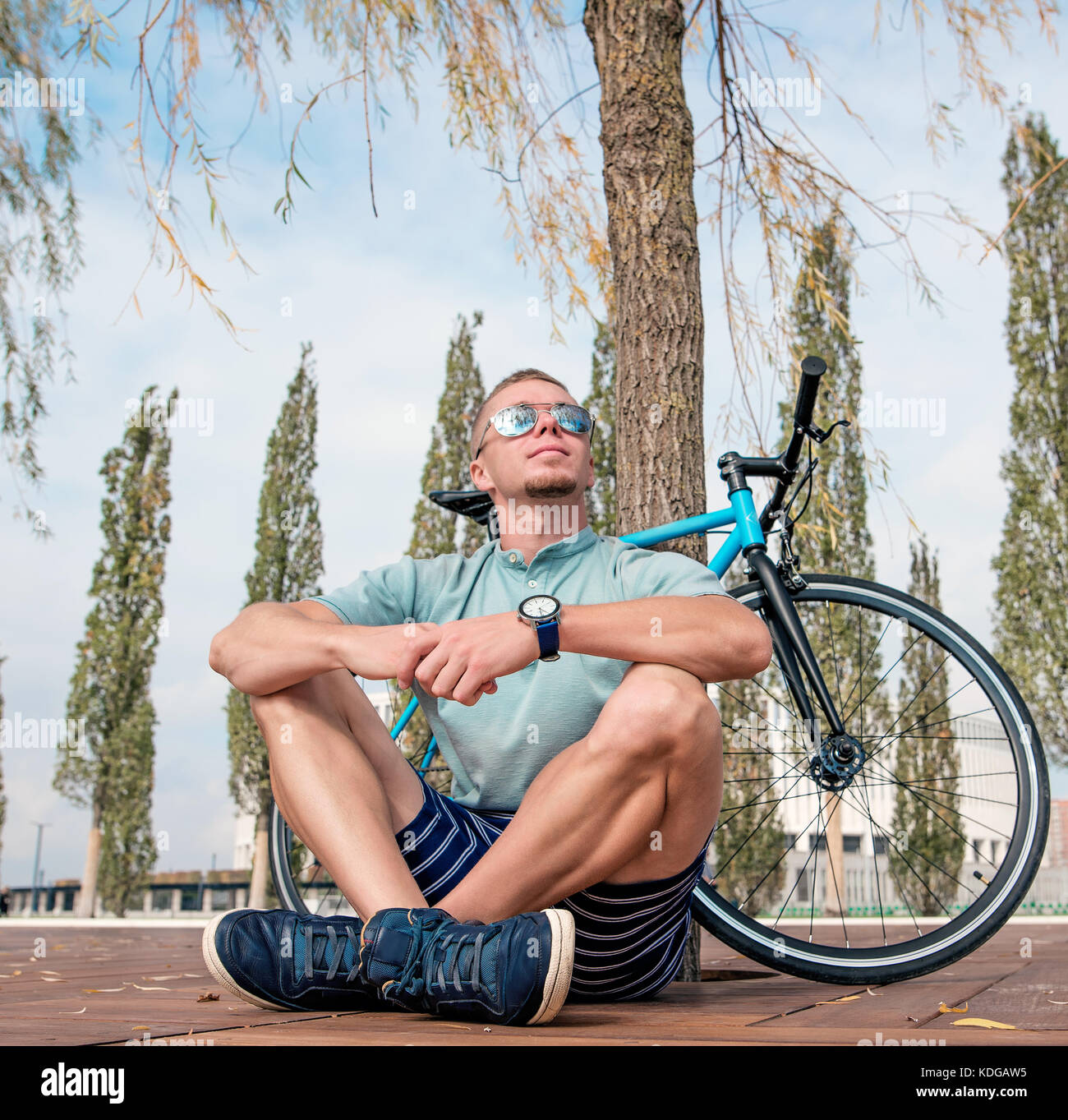 Athletic person bike standing hi-res stock photography and images - Alamy