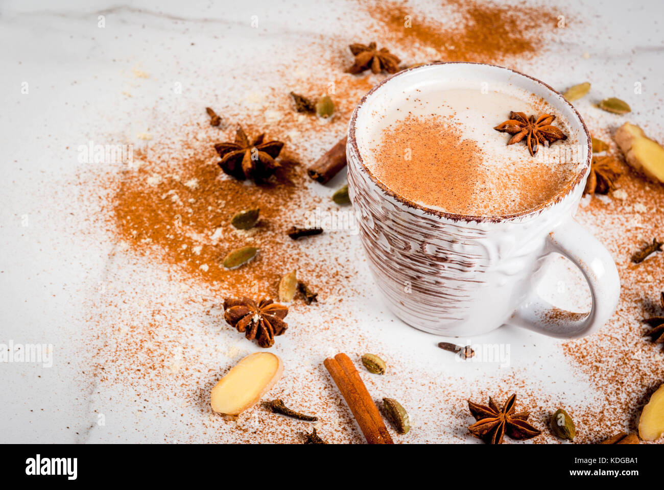 Traditional indian masala chai tea with spices - cinnamon, cardamom ...