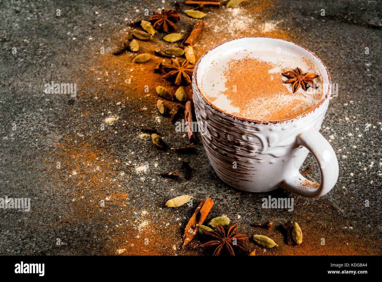 Traditional indian masala chai tea with spices - cinnamon, cardamom ...