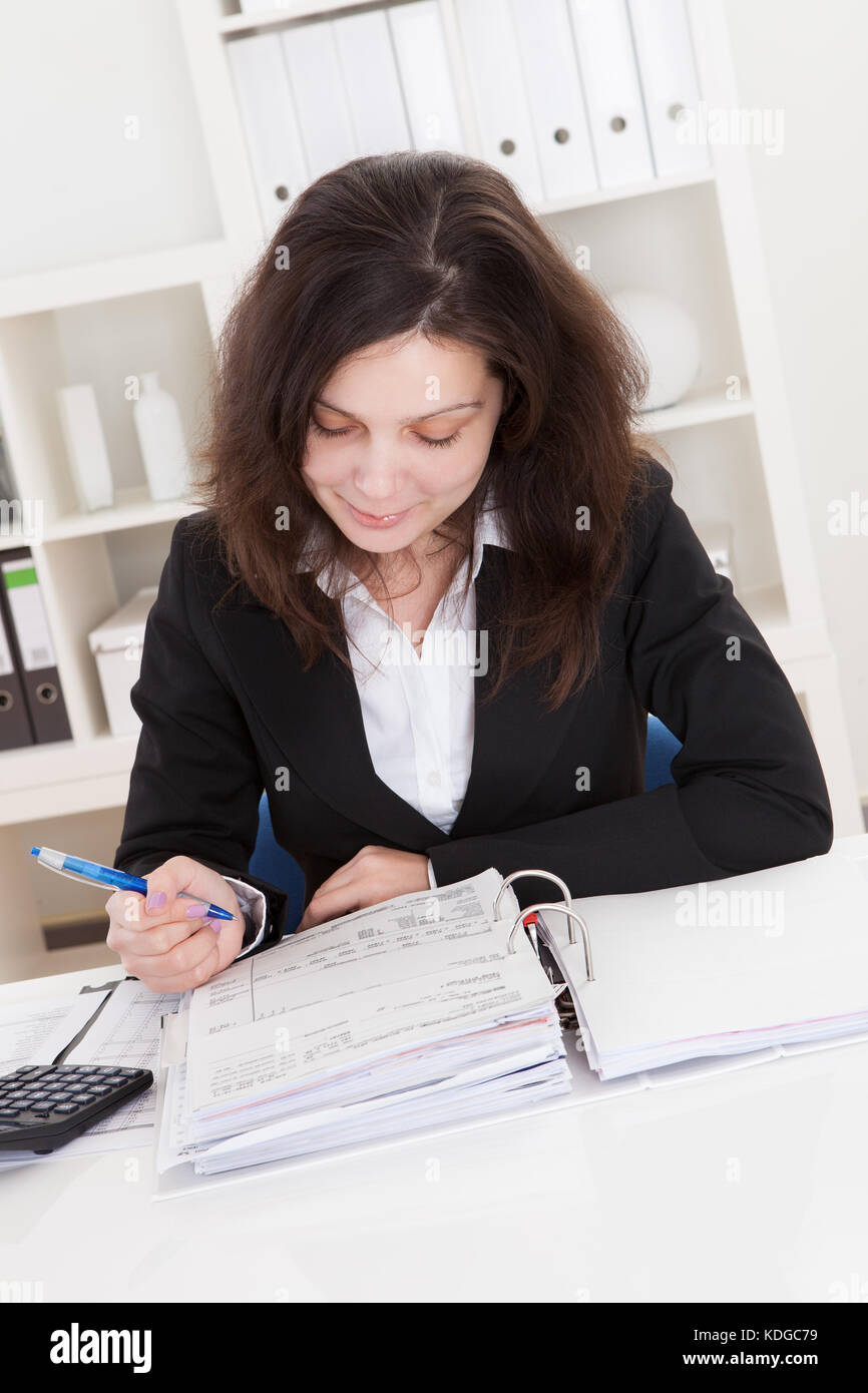Pretty female accountant working hi-res stock photography and images ...