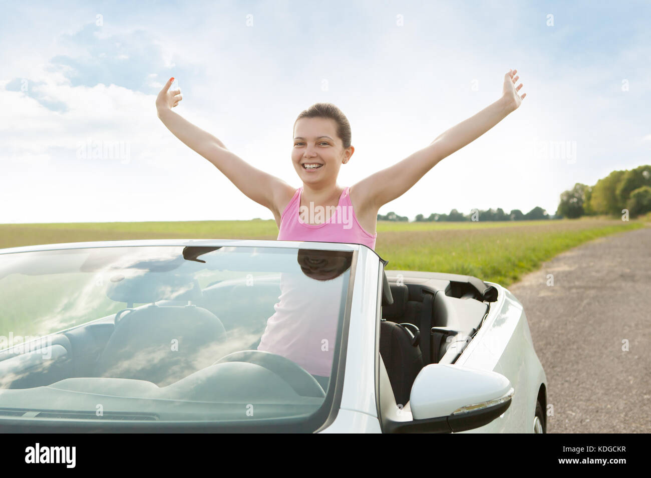 Woman raising hand hi-res stock photography and images - Alamy