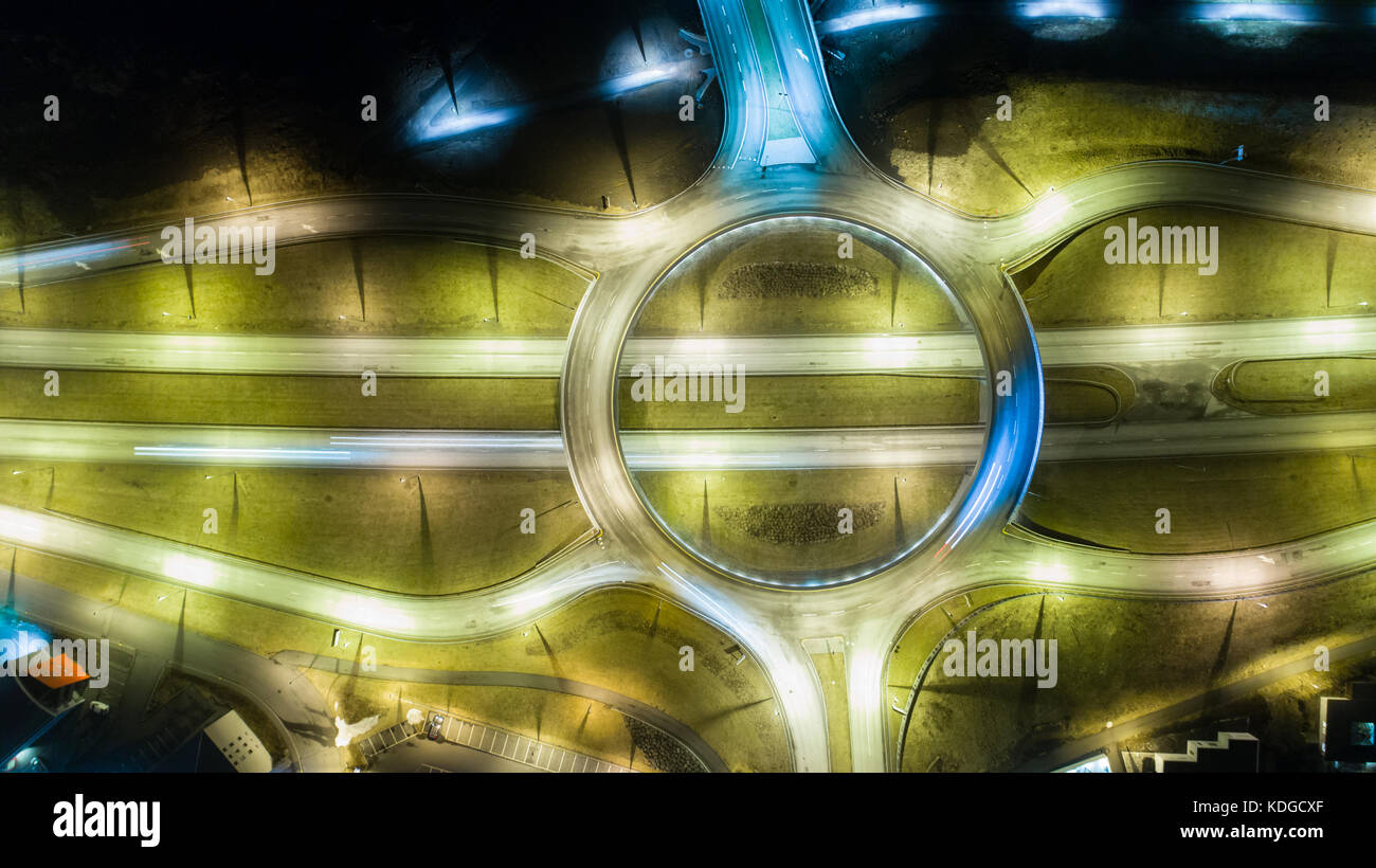 Aerial shot of a roundabout shot at night looking straight down Stock ...
