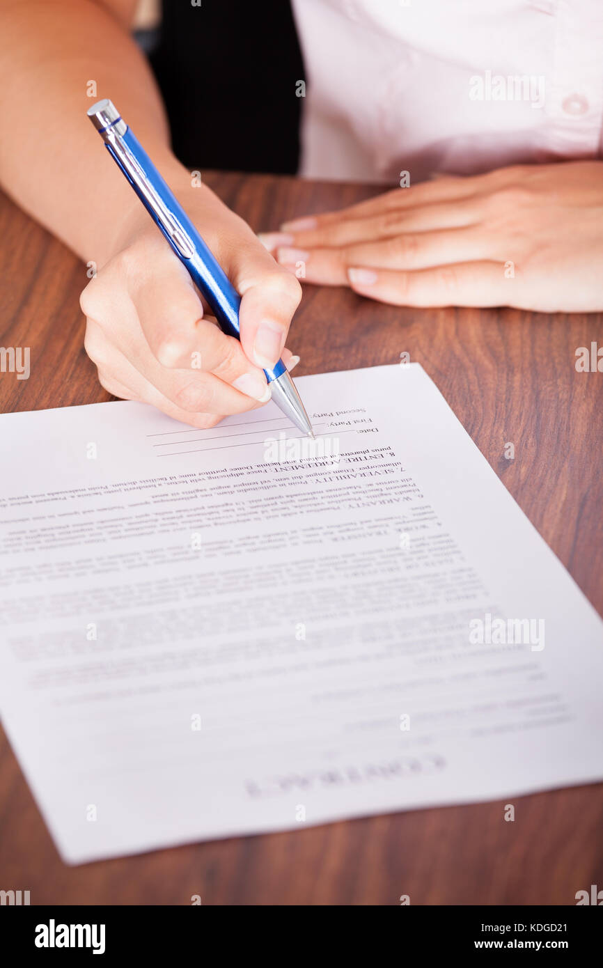 Human hand signing authority document hi-res stock photography and ...