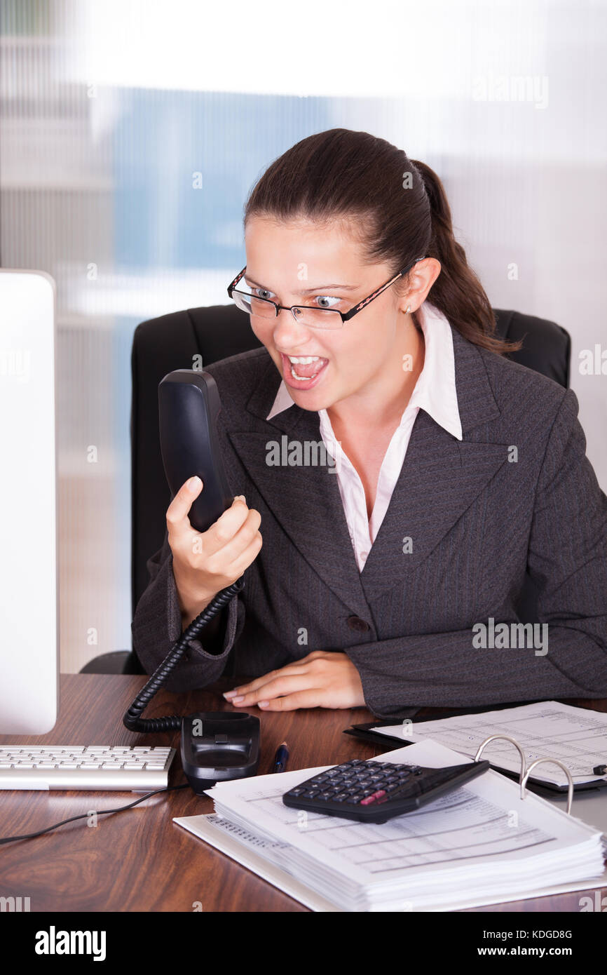 Angry telephone call woman hi-res stock photography and images - Alamy