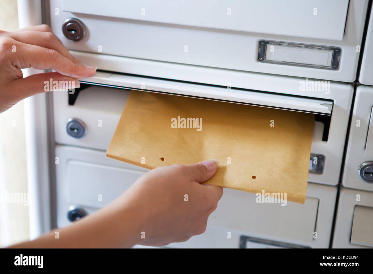 Envelope in letterbox hi-res stock photography and images - Alamy